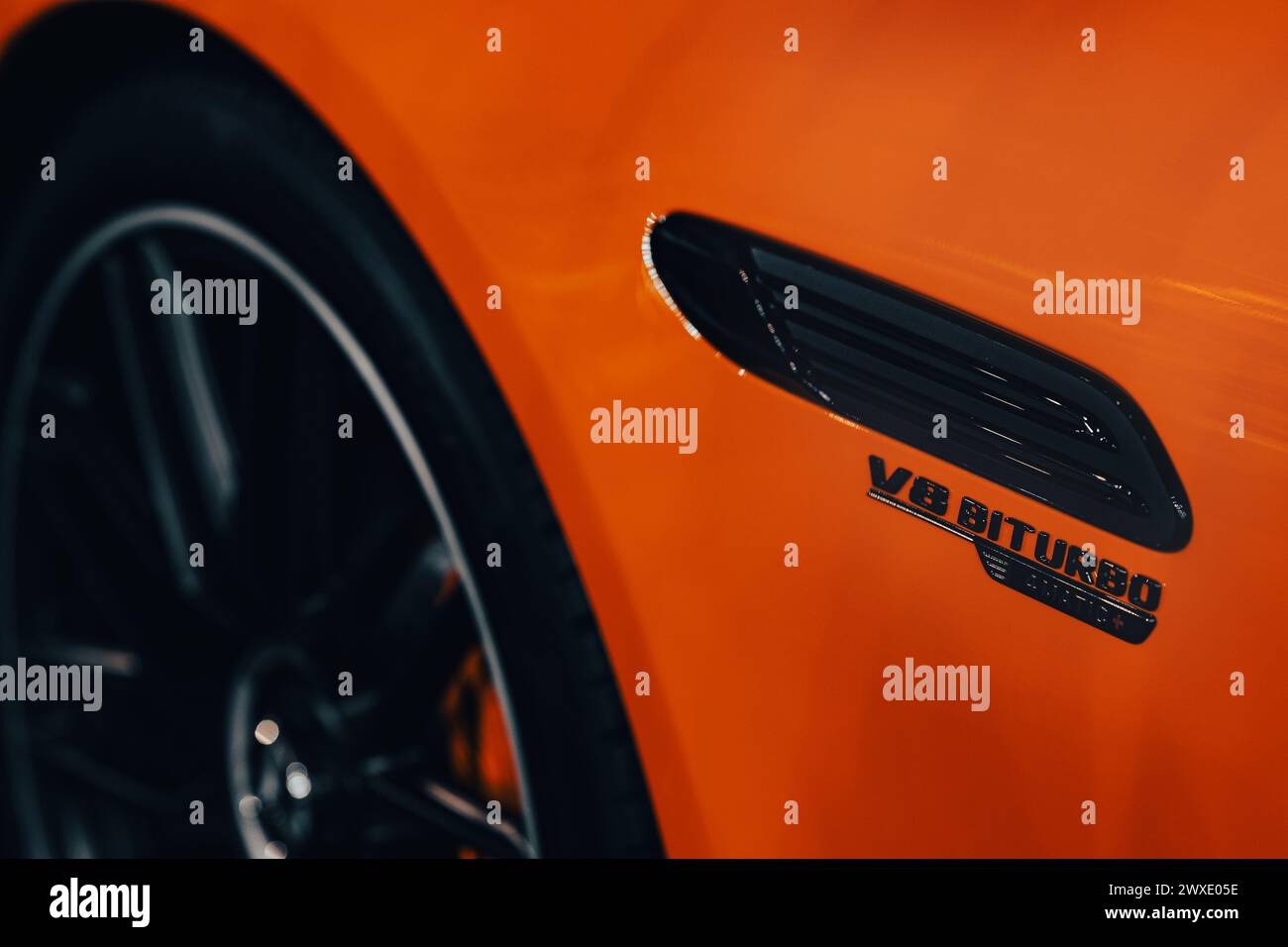 A closeup shot of the V8 BITURBO on a luxury Mercedes-Benz AMG SL with ...