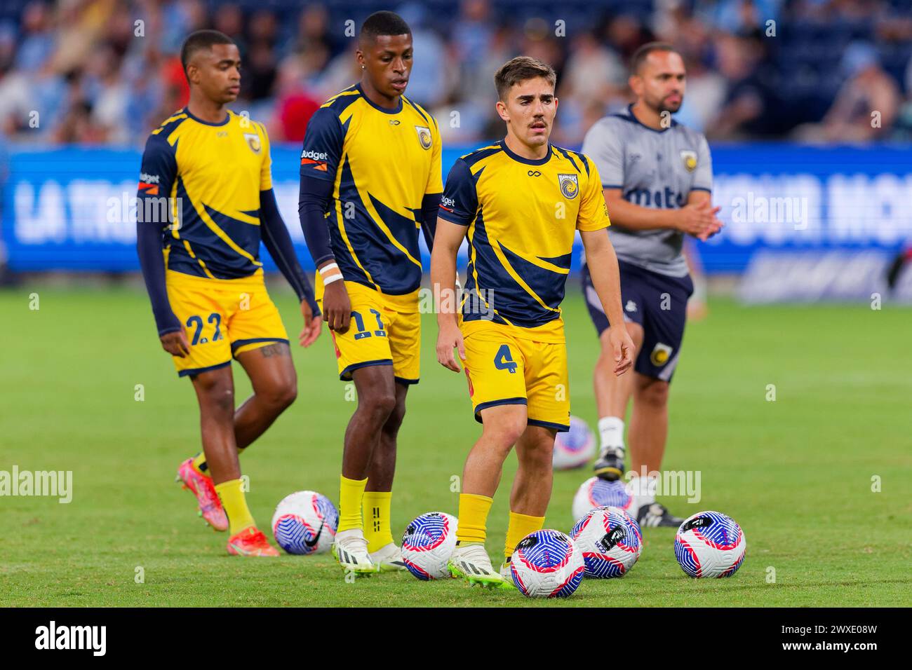 Sydney, Australia. 30th Mar, 2024. Mariners players warm up before the ...
