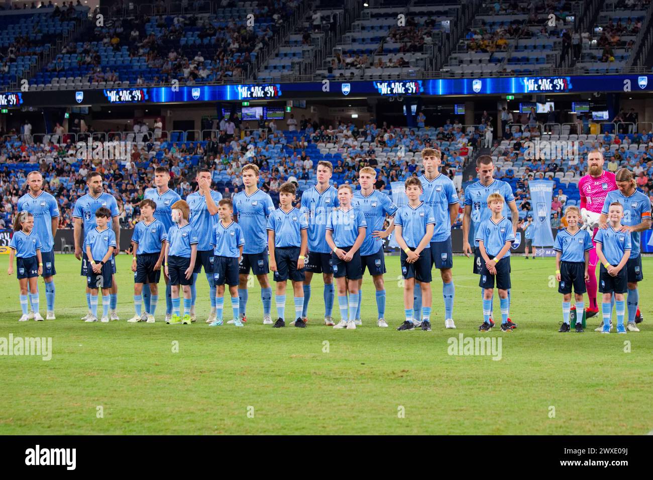 Sydney, Australia. 30th Mar, 2024. Sydney FC players line up on the ...
