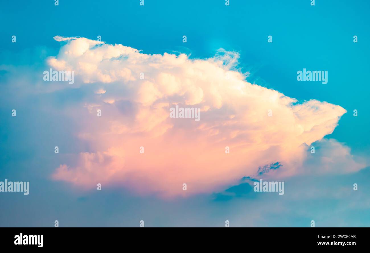 Pink anvil cloud texture at sunset Stock Photo - Alamy