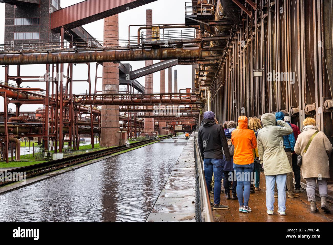 Visitor group at Zeche Zollverein cokery building , industrial ...