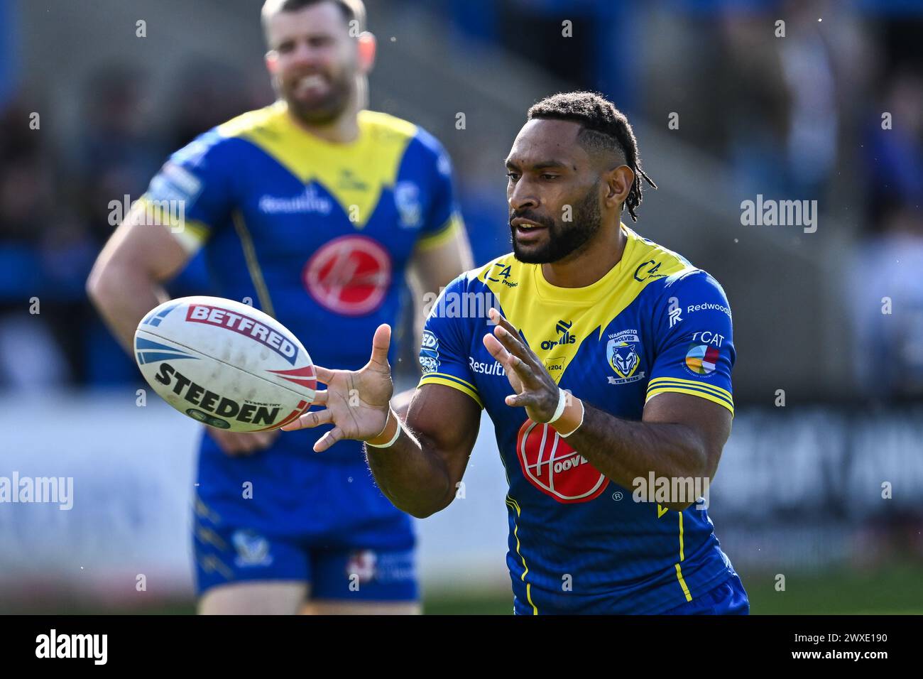 Rodrick Tai of Warrington Wolves during pre match warm up ahead of the ...