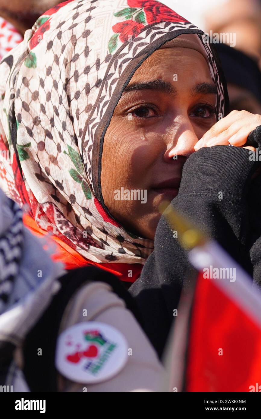 A person crying whilst taking part in Stop the Genocide in Gaza ...