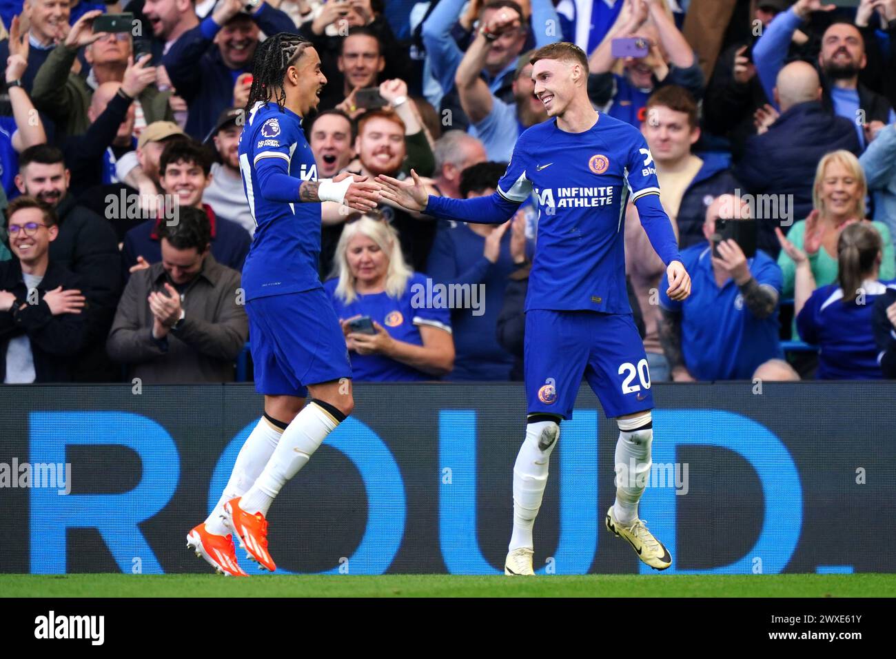Chelsea's cole palmer (right) celebrates scoring their side's first ...