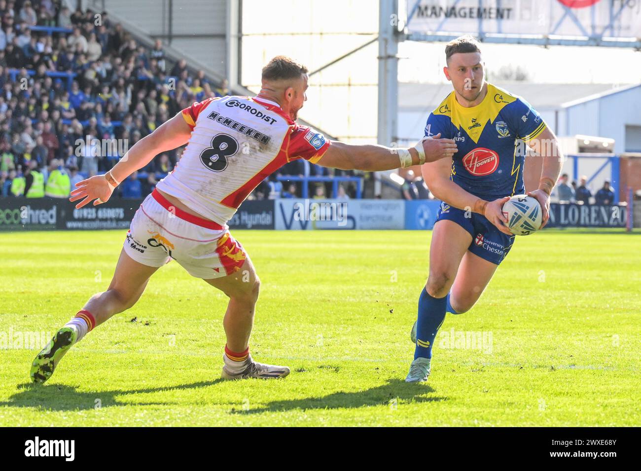 George Williams of Warrington Wolves makes a break during the Betfred ...