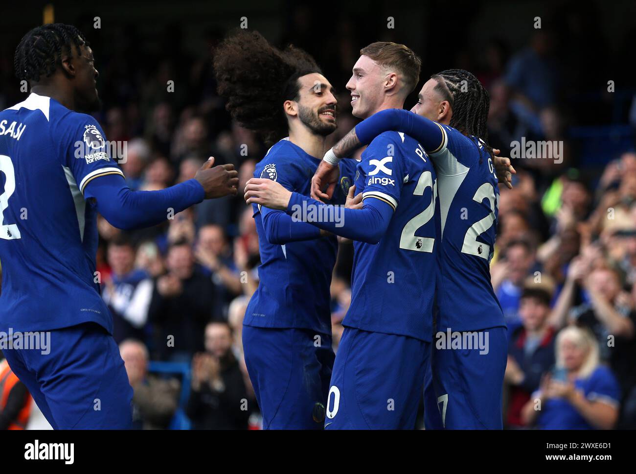 Chelsea's Cole Palmer (second right) celebrates scoring their side's ...