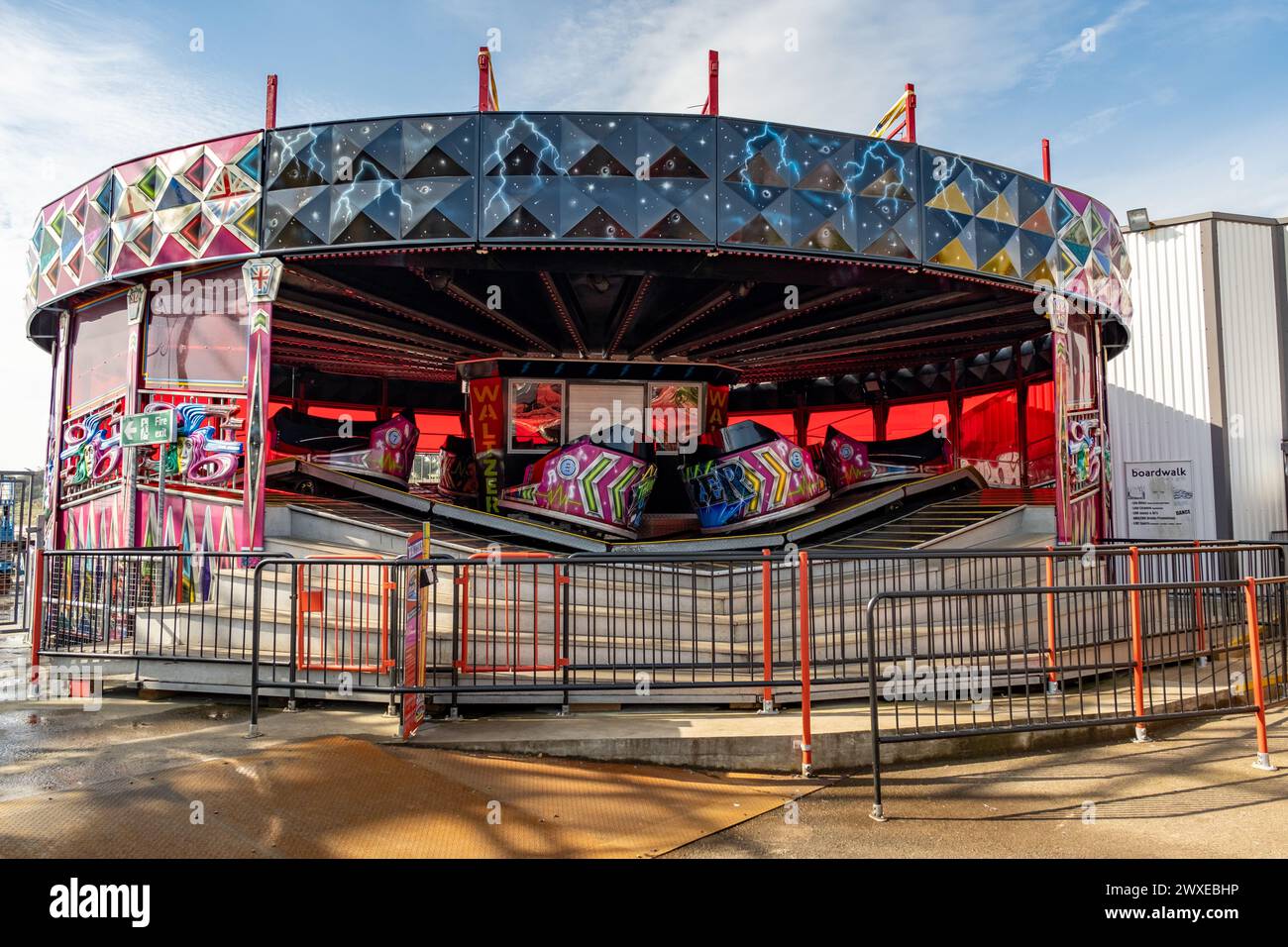 Clacton-on-Sea, Essex, UK – March 20 2024. Spinning car ride on Clacton ...