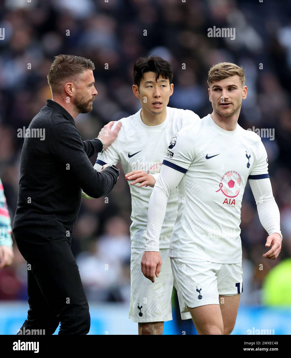 Luton Town manager Rob Edwards (left) congratulates Tottenham Hotspur's ...