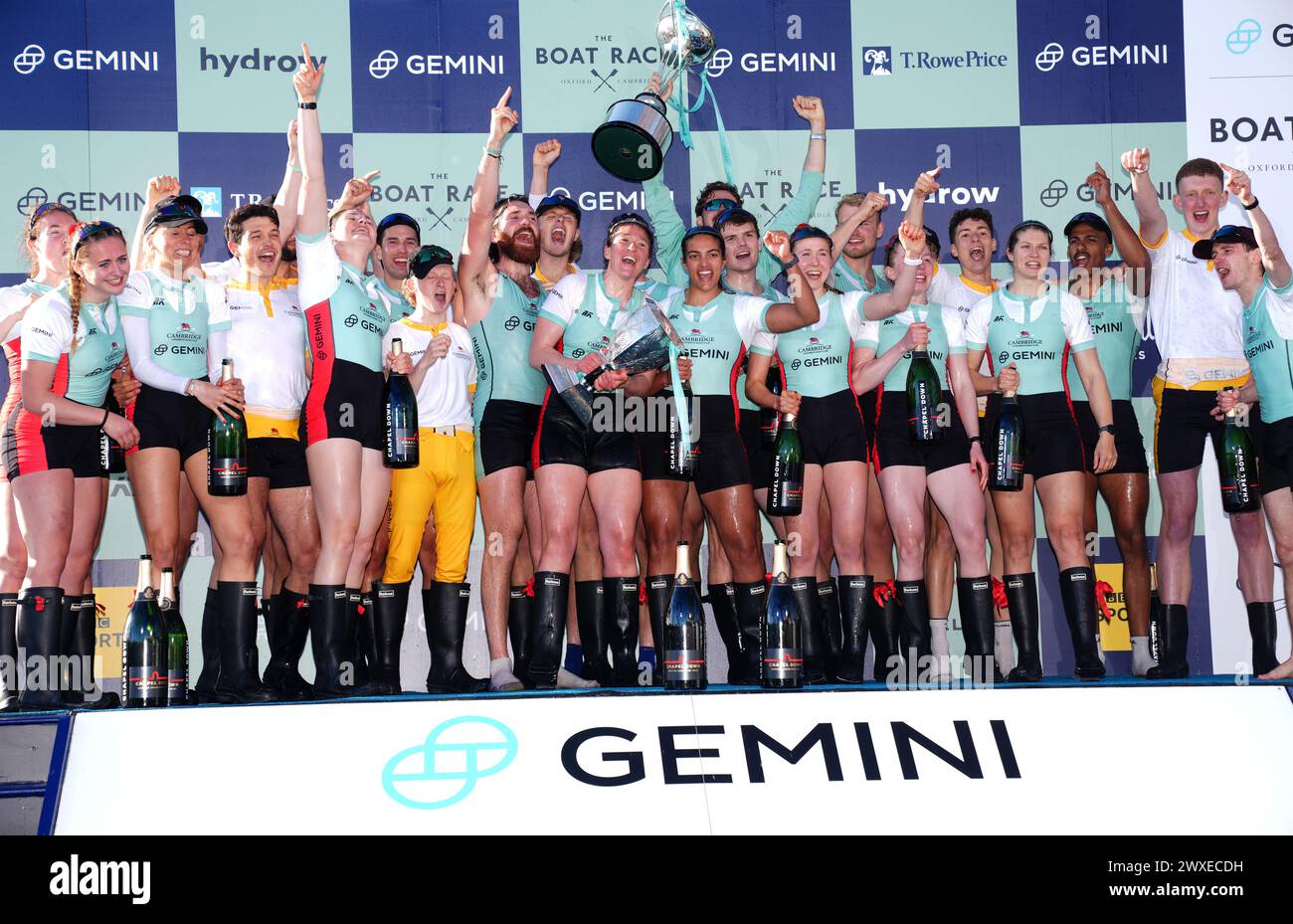 Cambridge Men's and Women's teams celebrate with the trophies after the ...