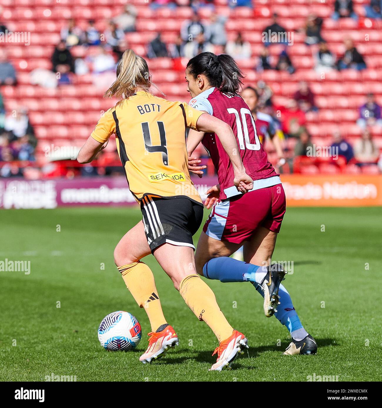 Walsall, UK. 30th Mar, 2024. Leicester's CJ Bott & Aston Villa's Kenza ...