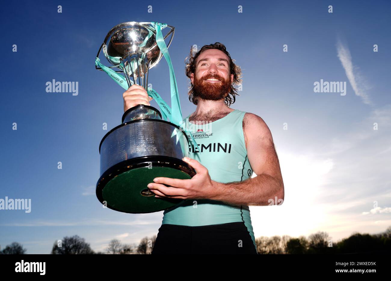 Cambridge Men's President Sebastian Benzecry celebrates with the trophy ...
