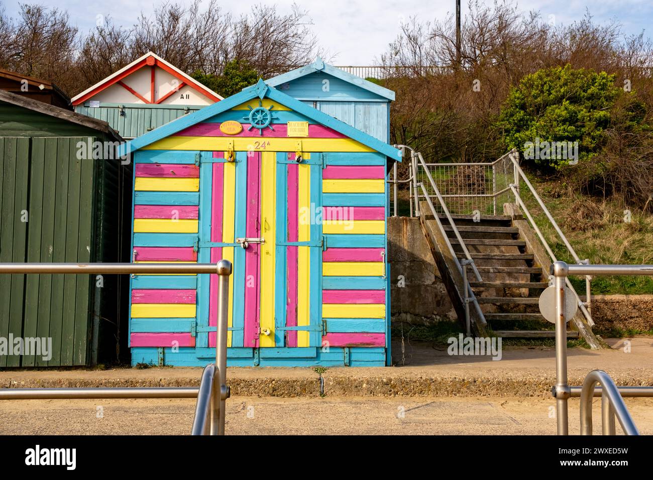 Clacton-on-Sea, Essex, UK – March 20 2024. Multi coloured beach hut on ...