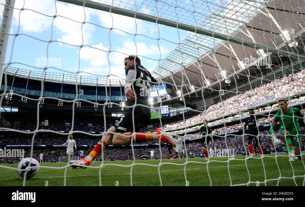 Luton Town's Alfie Doughty clears a ball off the line to save a goal ...
