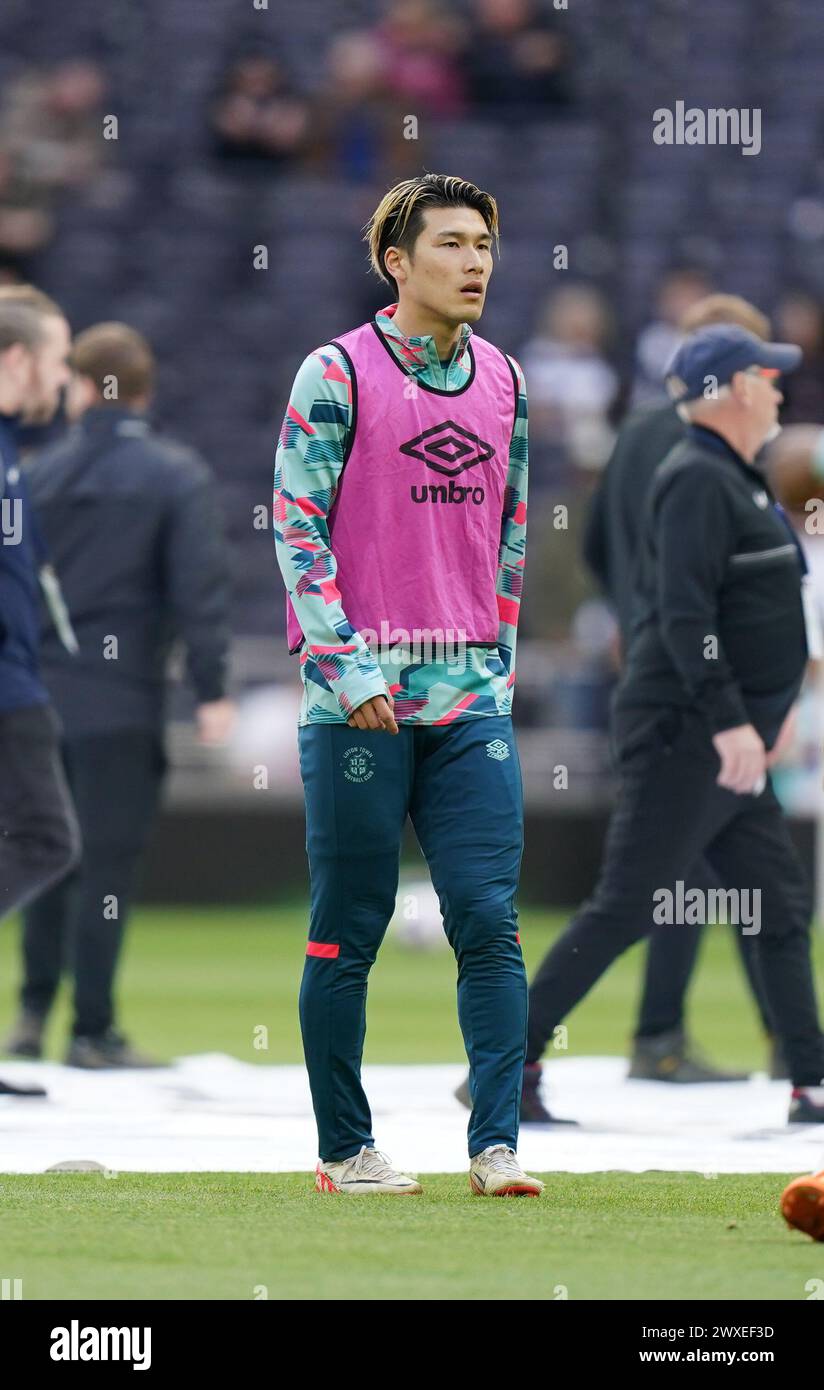 LONDON, ENGLAND - MARCH 30: Daiki Hashioka of Luton Town warming up ...