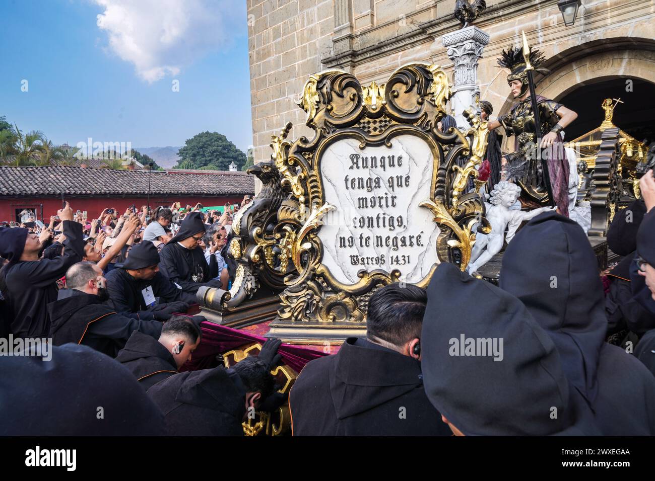 Antigua, Guatemala. 29th Mar, 2024. Catholic penitents watch the ...