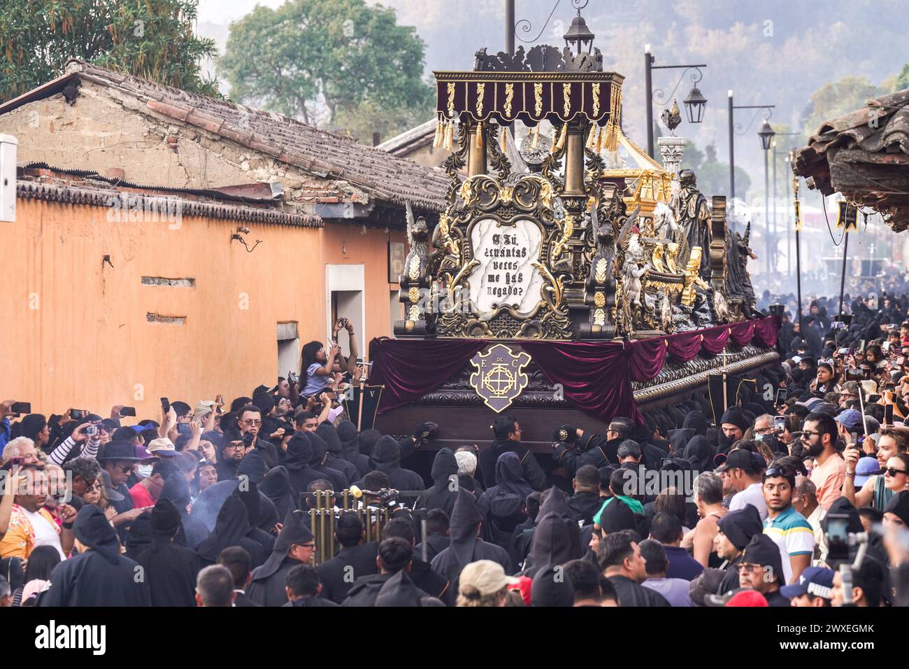 Antigua, Guatemala. 29th Mar, 2024. Catholic penitents carry the ...