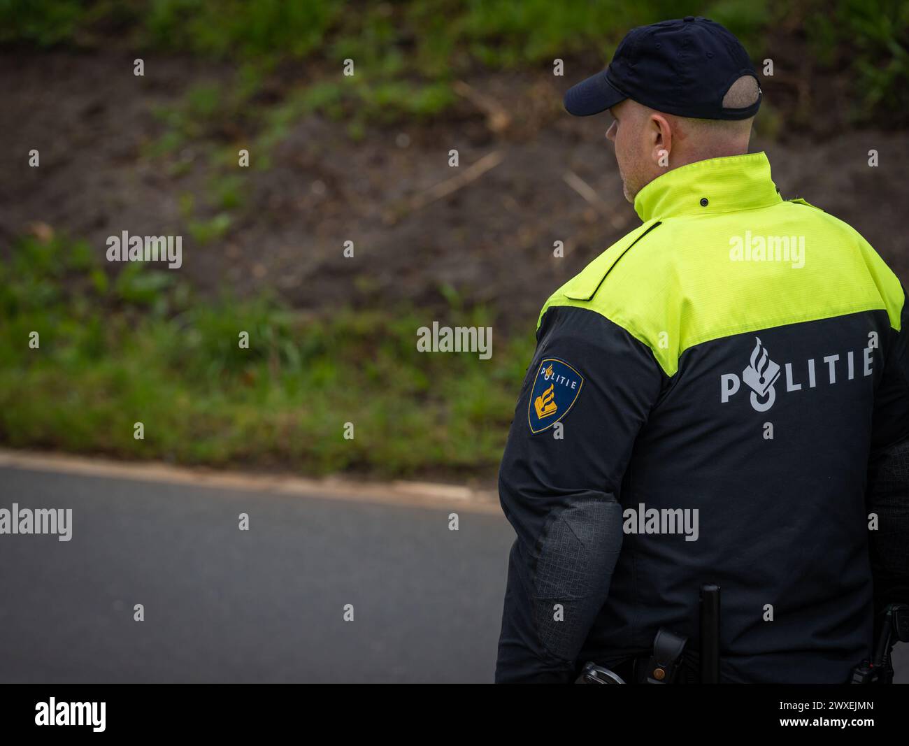 Amsterdam, The Netherlands, 30.03.2024, Rear view of dutch police ...