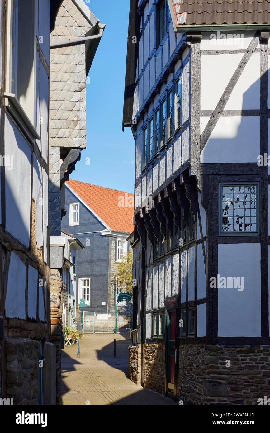 Narrow passageway between half-timbered houses in the historic centre ...