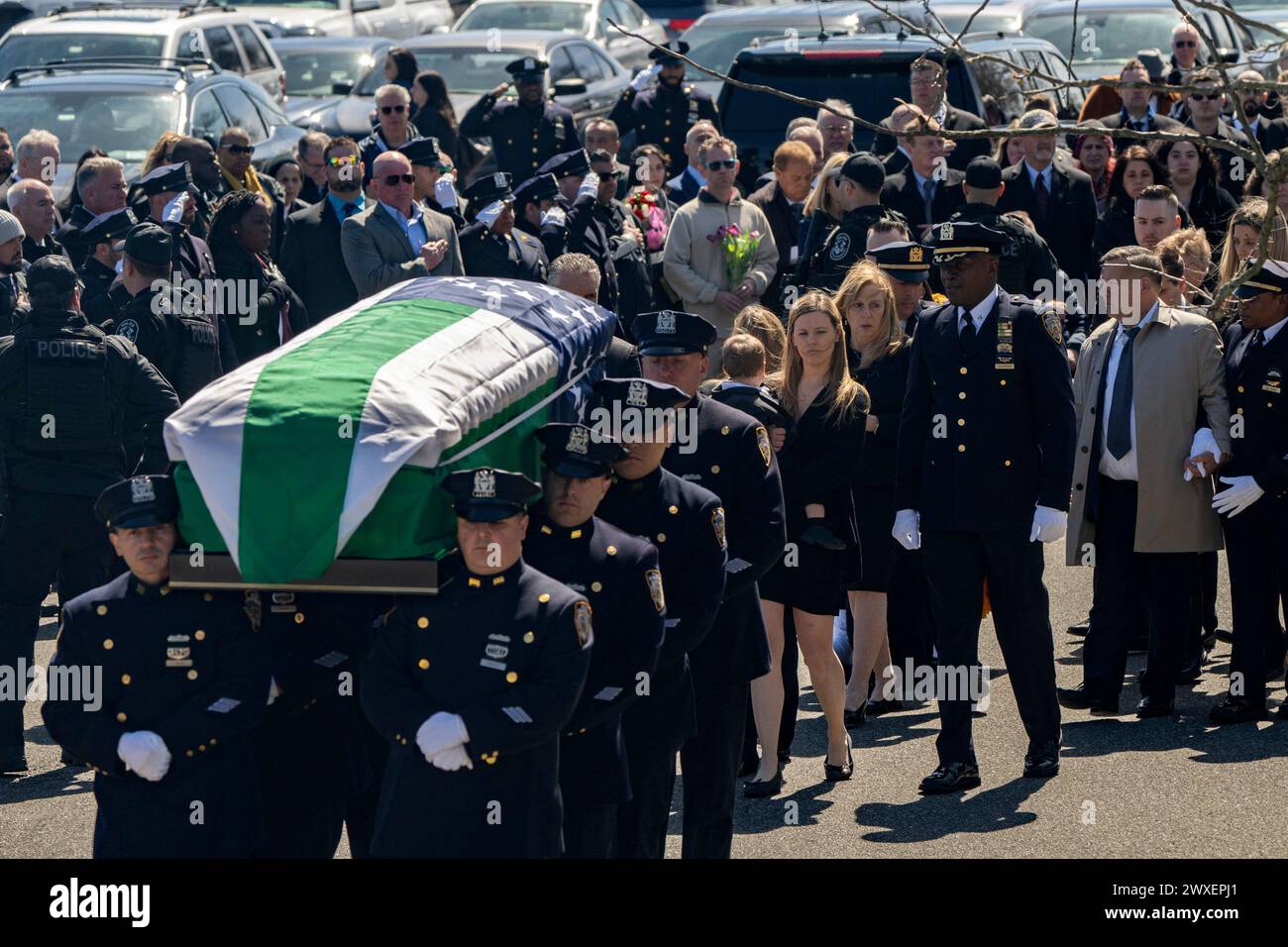 Jonathan Diller's wife Stephanie Diller and her son walk behind the ...