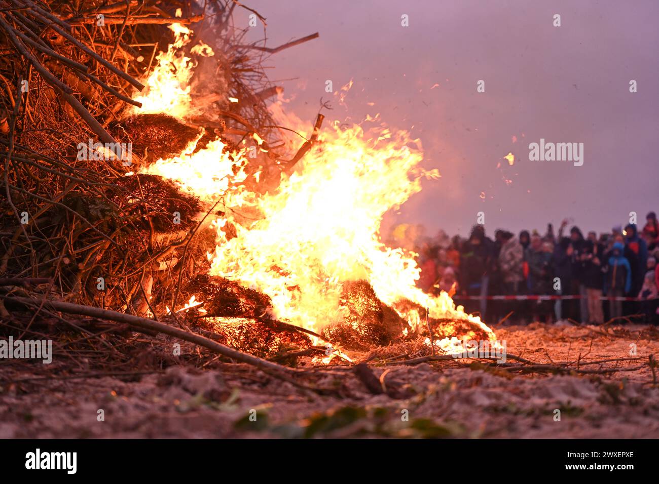 Norddeich, Germany. 30th Mar, 2024. An Easter bonfire on the beach ...