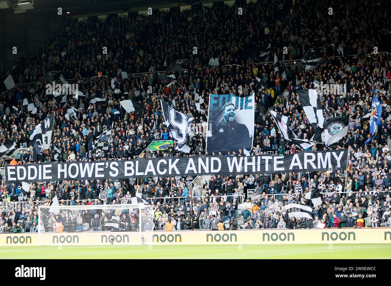 Newcastle United fans display banners and flags in the stand during the ...