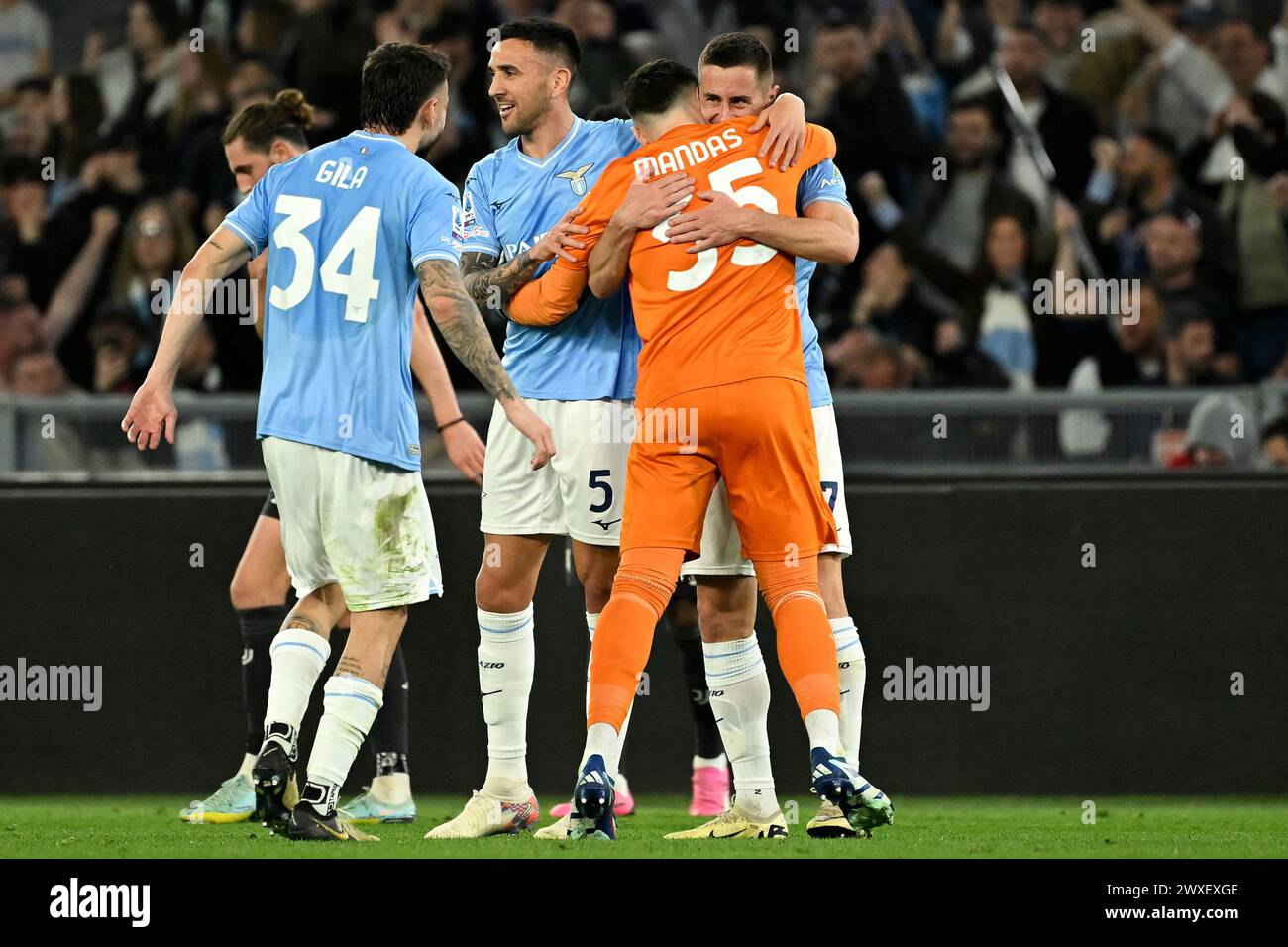 Rome, Italy. 30th Mar, 2024. Adam Marusic of SS Lazio (r) celebrates ...