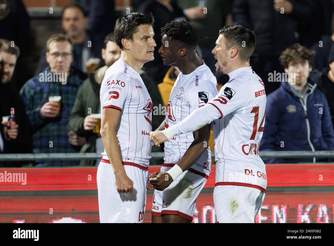 Deinze, Belgium. 30th Mar, 2024. Essevee's Jelle Vossen celebrates ...