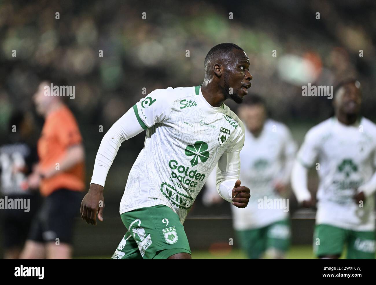 La Louviere, Belgium. 30th Mar, 2024. RAAL's Mohamed Soumar? celebrates ...