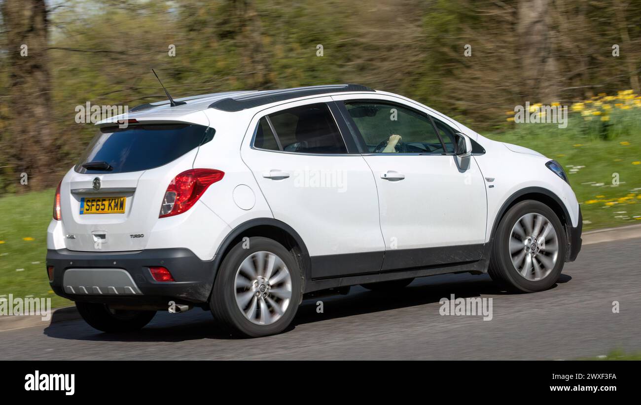 Milton Keynes,UK-Mar 30th 2024: 2016 white Vauxhall Mokka car driving ...