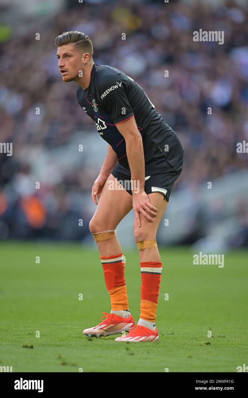 London, UK. 30th Mar, 2024. Reece Burke of Luton Town during the Spurs ...