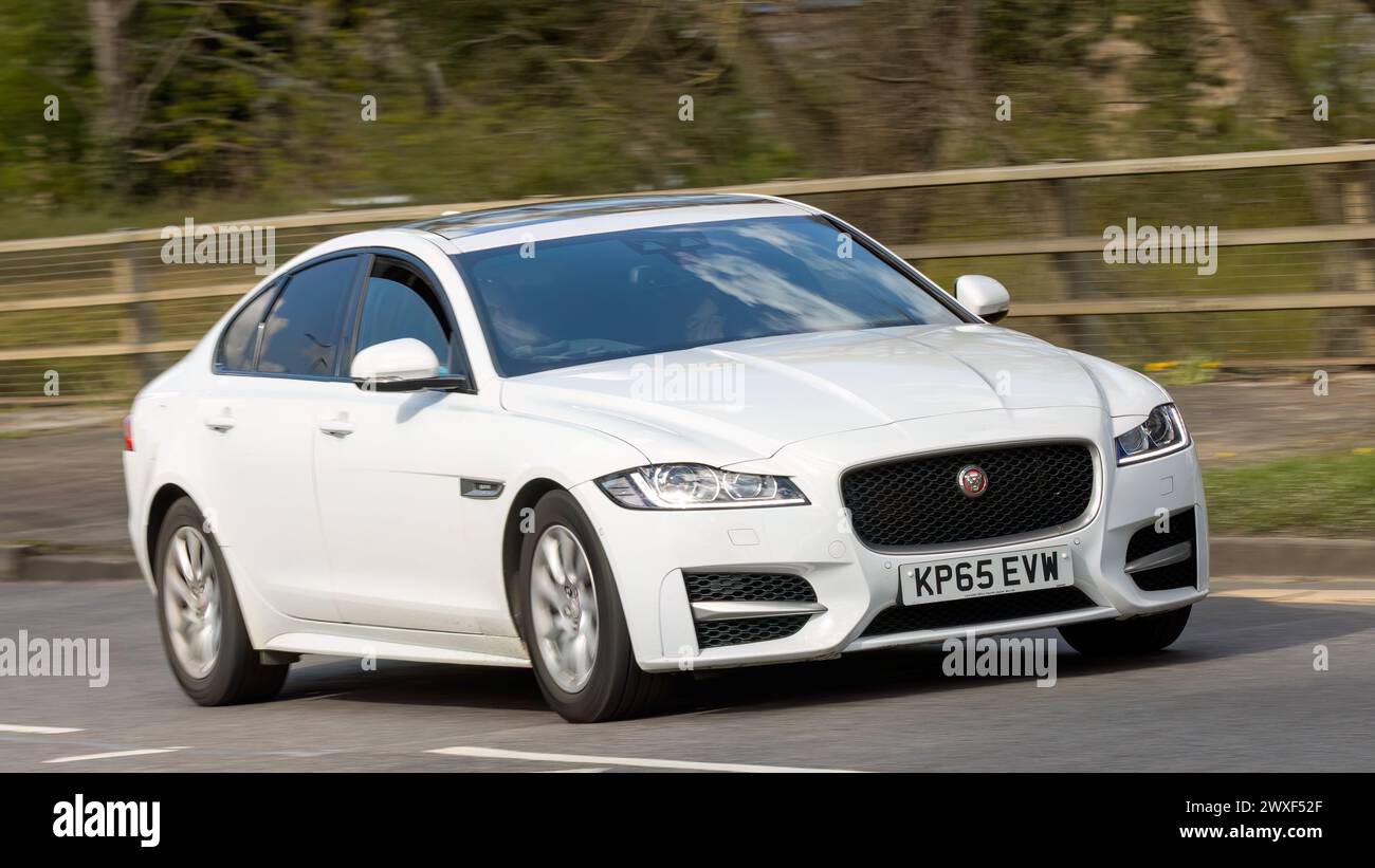 Milton Keynes,UK-Mar 30th 2024: 2015 white Jaguar XF diesel engine car ...
