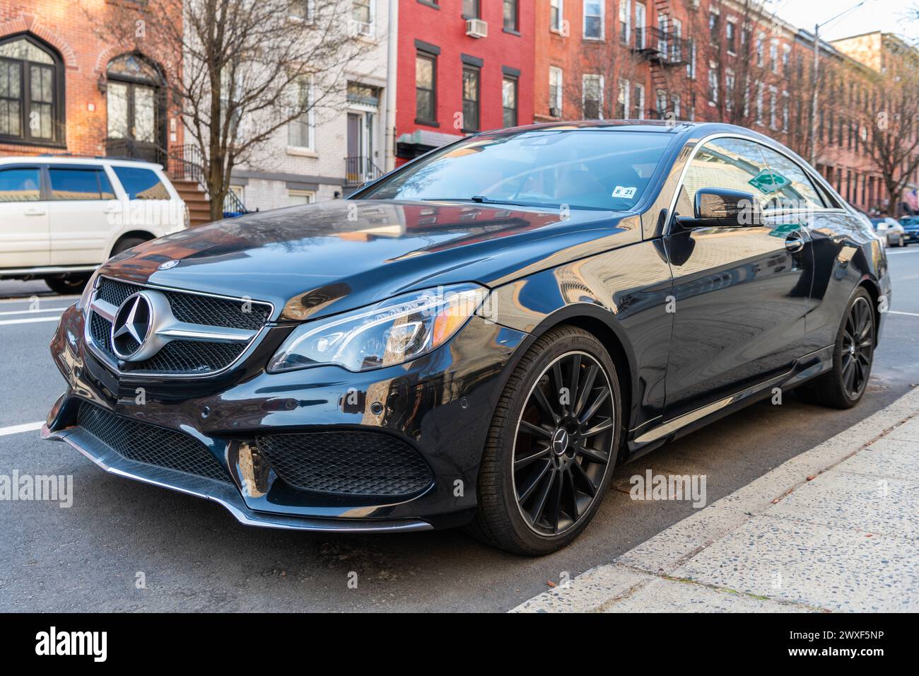 New York City, USA - March 15, 2024: 2014 Mercedes Benz E550 luxury car ...