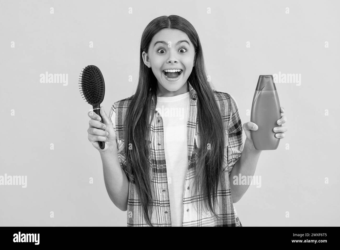 Haircare Of Amazed Teen Girl With Hairbrush Teen Girl Taking Care Of