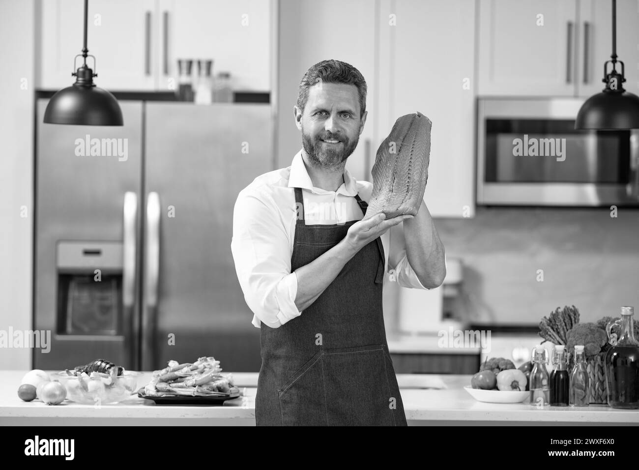 chef man cooking fish. chef man cooking fish. chef man cooking fish ...