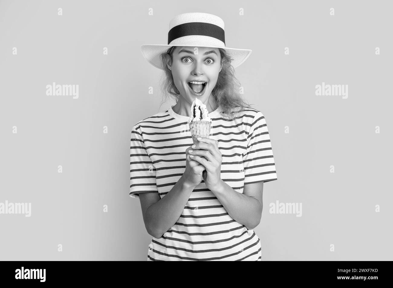 summer woman eat sweet cone in studio. summer woman with sweet cone ...