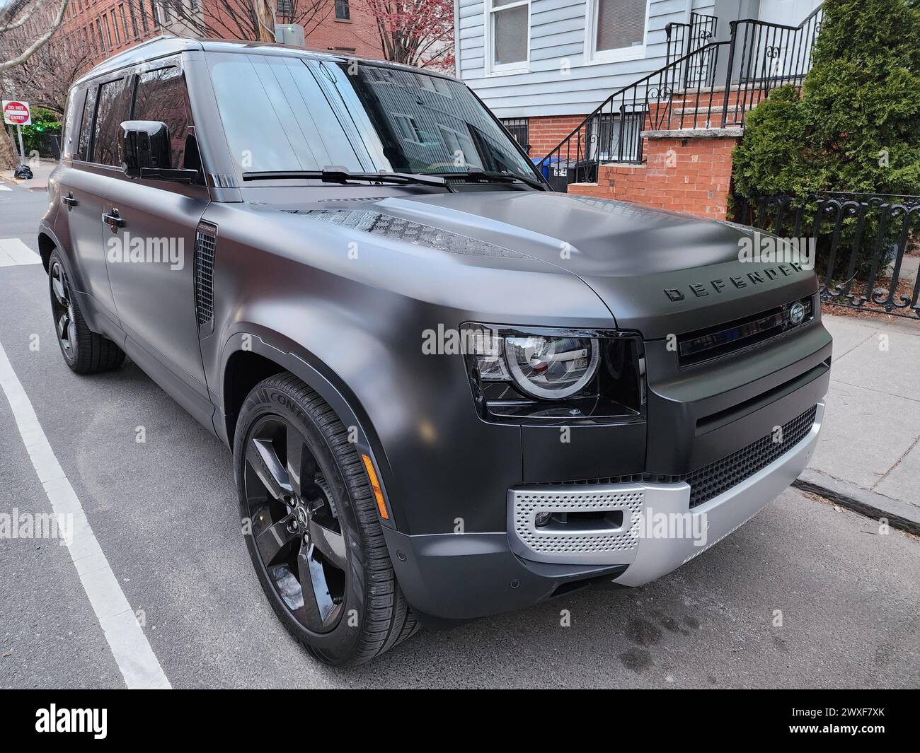 New York City, USA - March 18, 2024: Land Rover Defender matte black ...