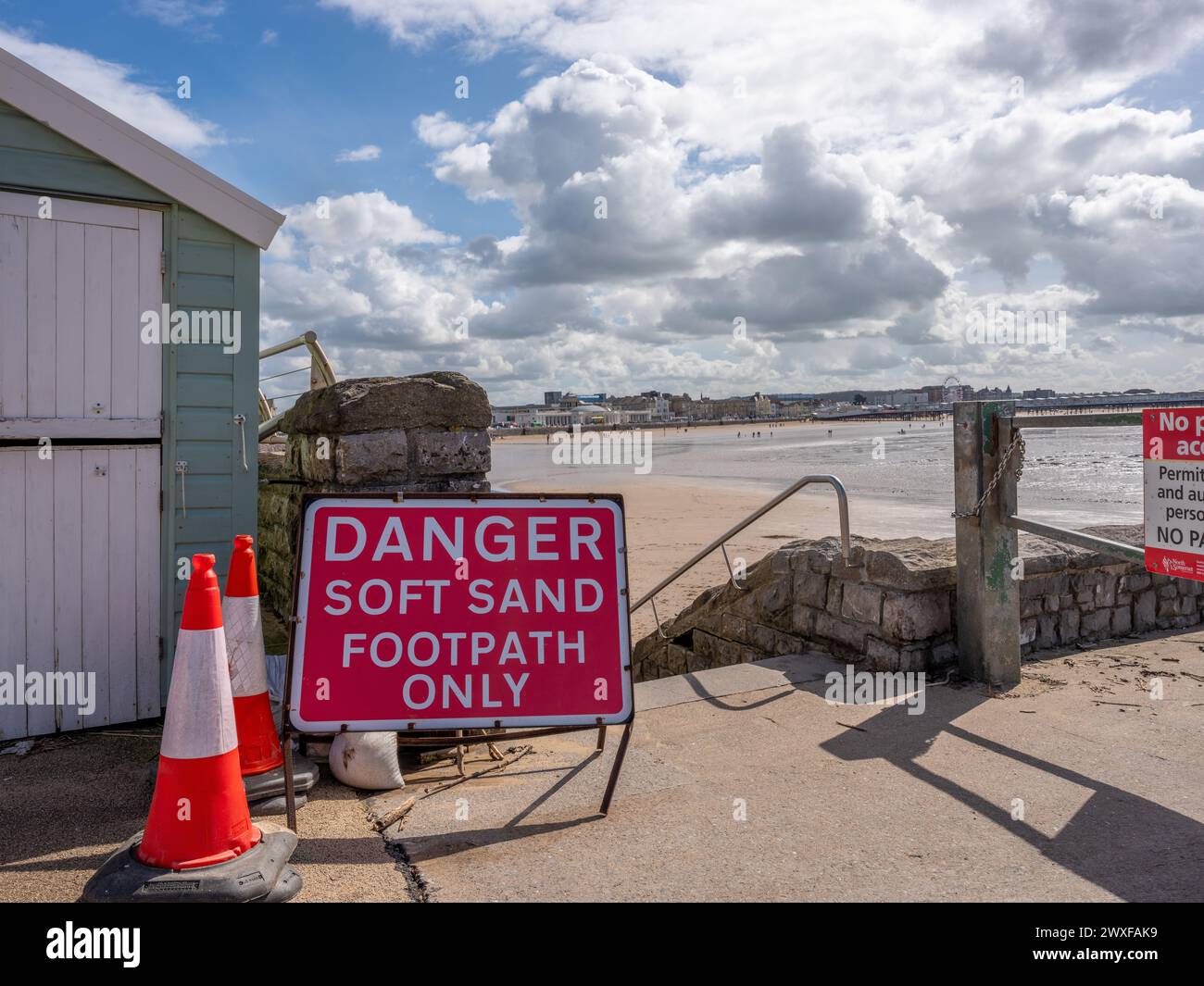 March 2024, Easter Saturday - Danger soft sand warning sign on a beach ...
