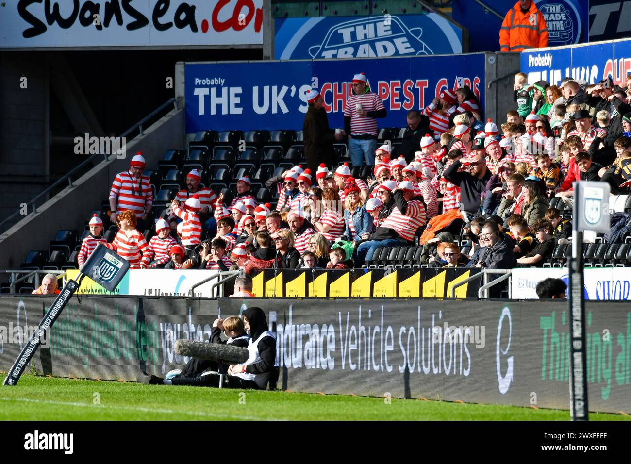Swansea, Wales. 30 March 2024. Ospreys fans wearing Where's Wally ...