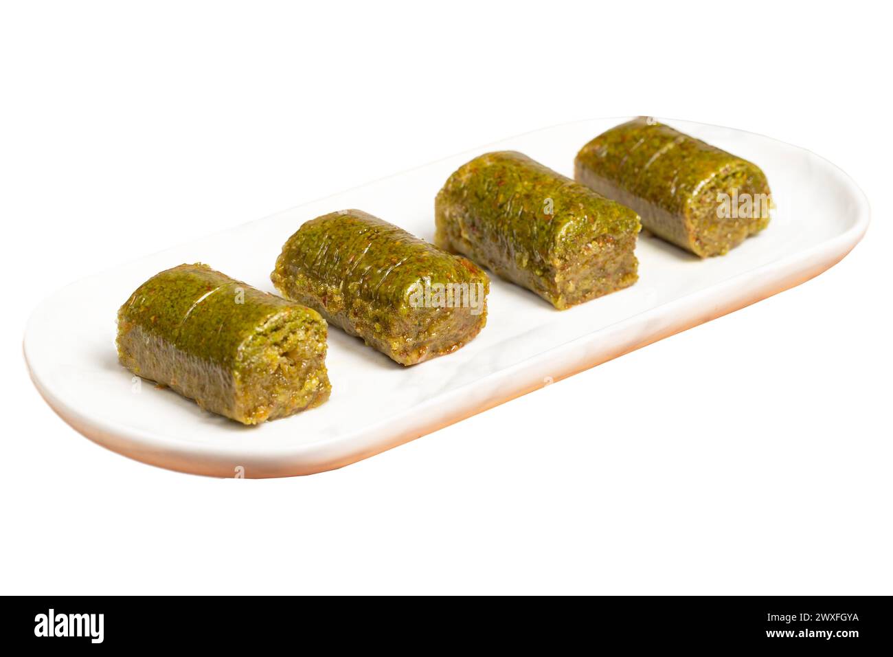 Baklava with pistachios isolated on white background. Turkish cuisine ...