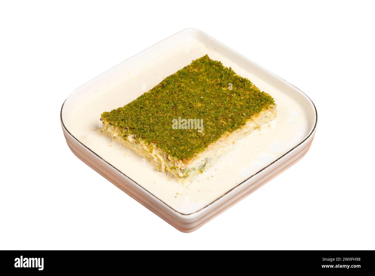 Kadayif dessert with pistachio and milk. Cold kadayif with chocolate ...