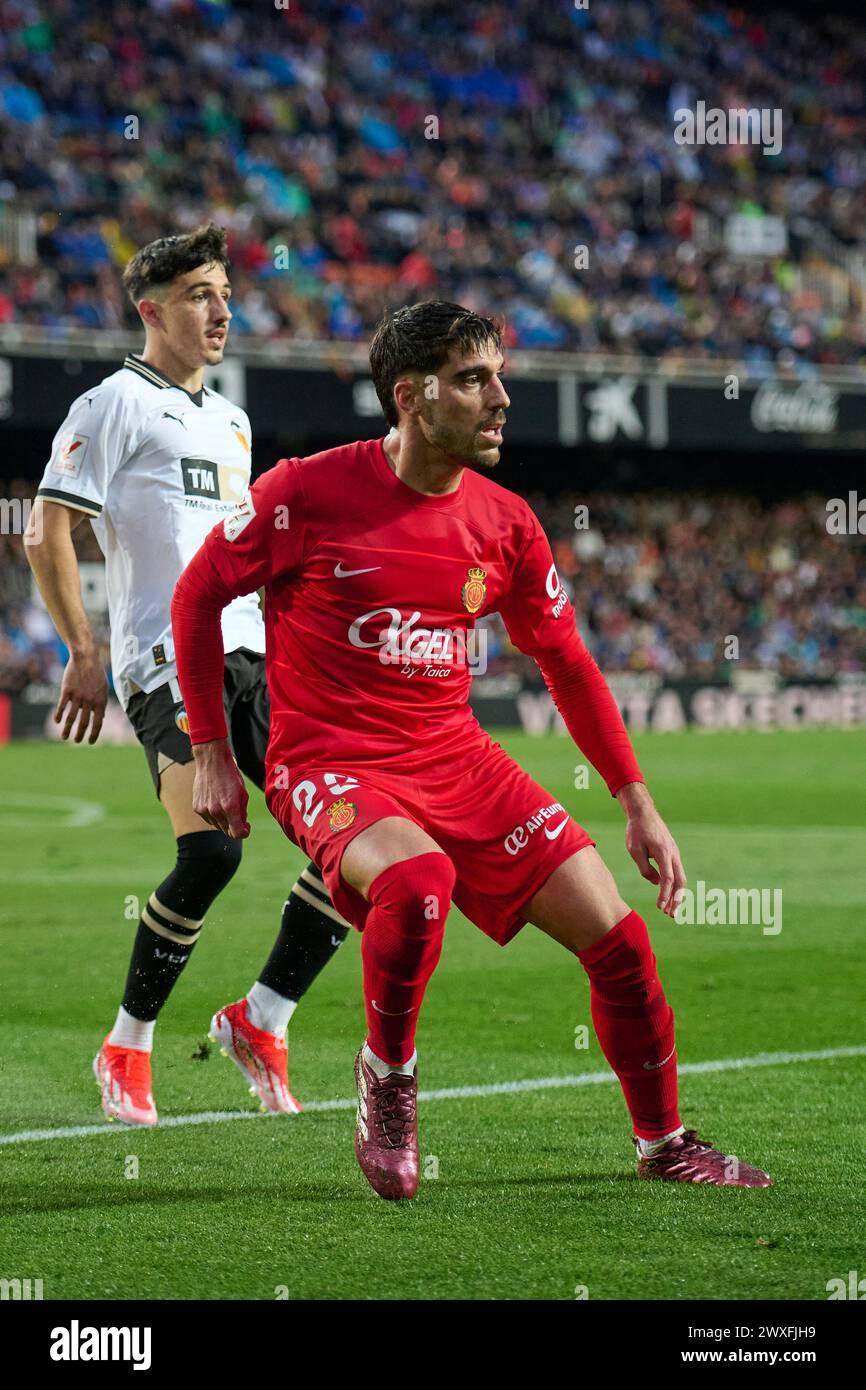 Giovanno Gonzalez of RCD Mallorca, Diego Lopez of Valencia CF in action ...