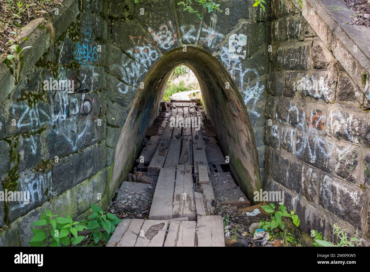 View of an old culvert under a railway embankment, Kiyevsky suburban ...