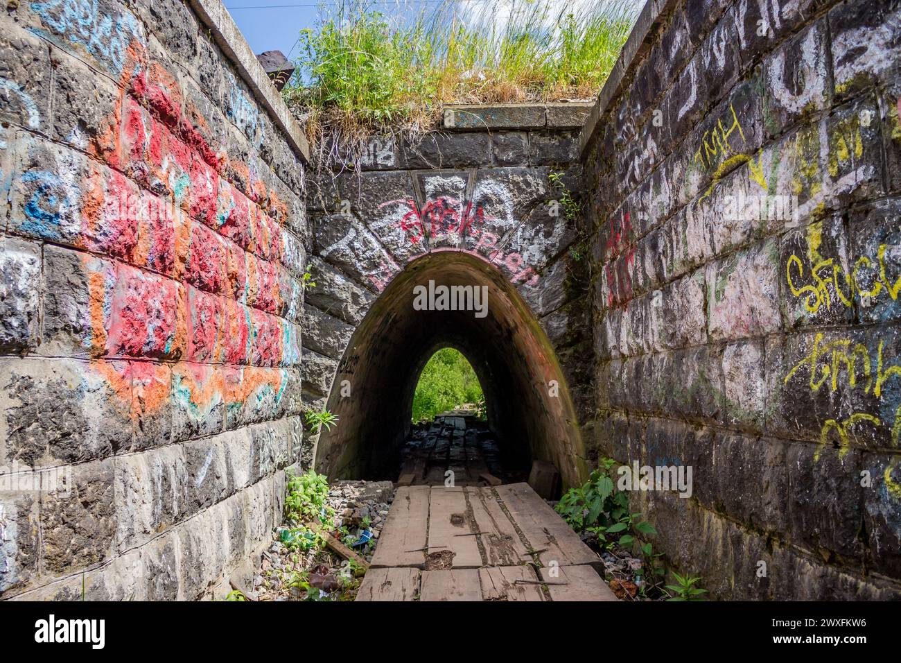 View of an old culvert under a railway embankment, Kiyevsky suburban ...