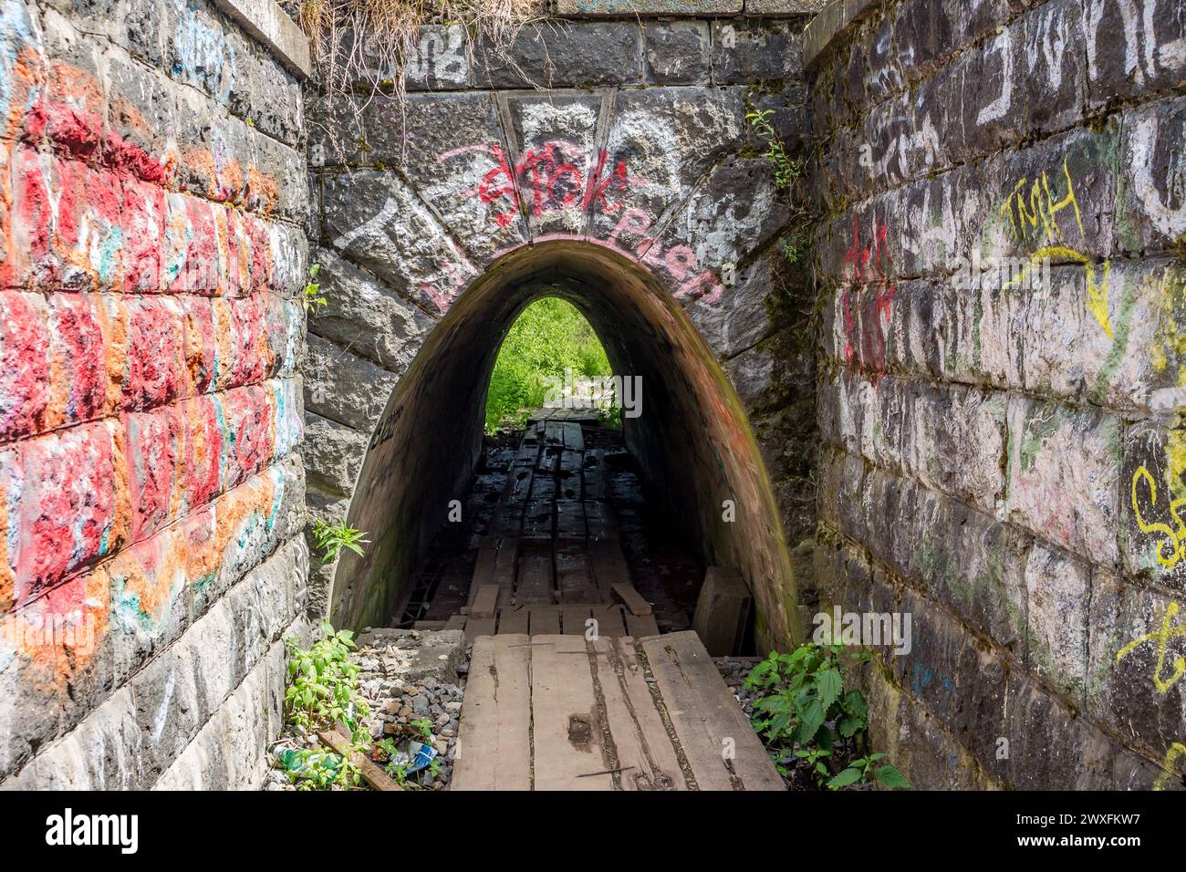 View of an old culvert under a railway embankment, Kiyevsky suburban ...