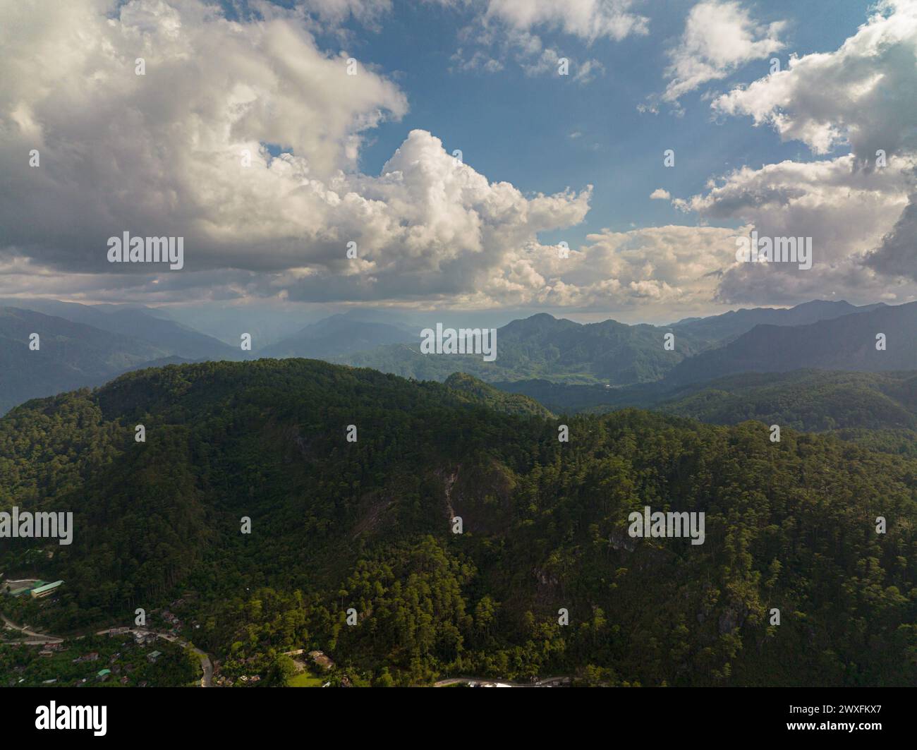 Tropical mountain range and mountain slopes with rainforest ...