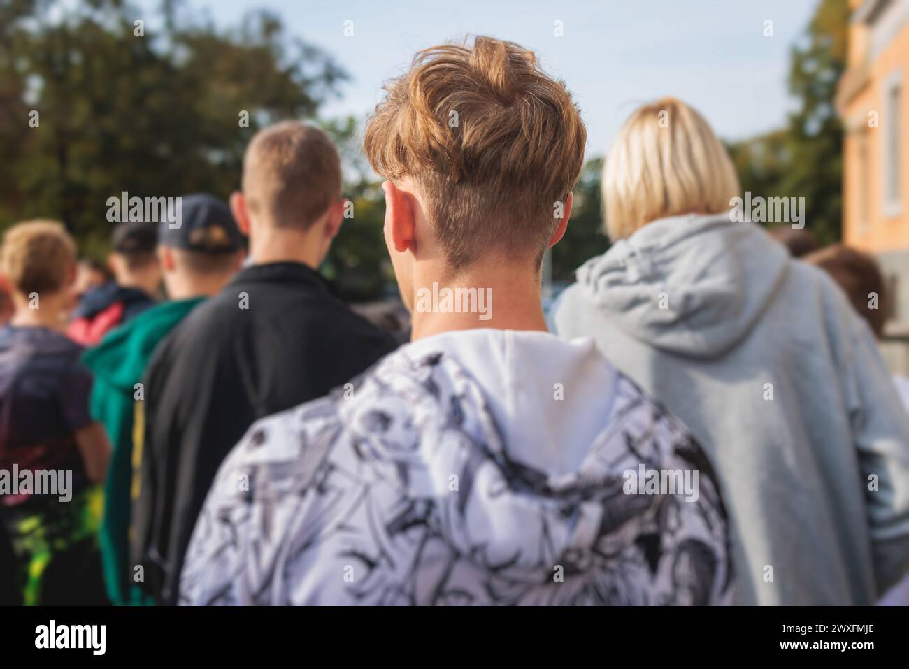 Group of students and school pupils on outdoor excursion tour in the ...