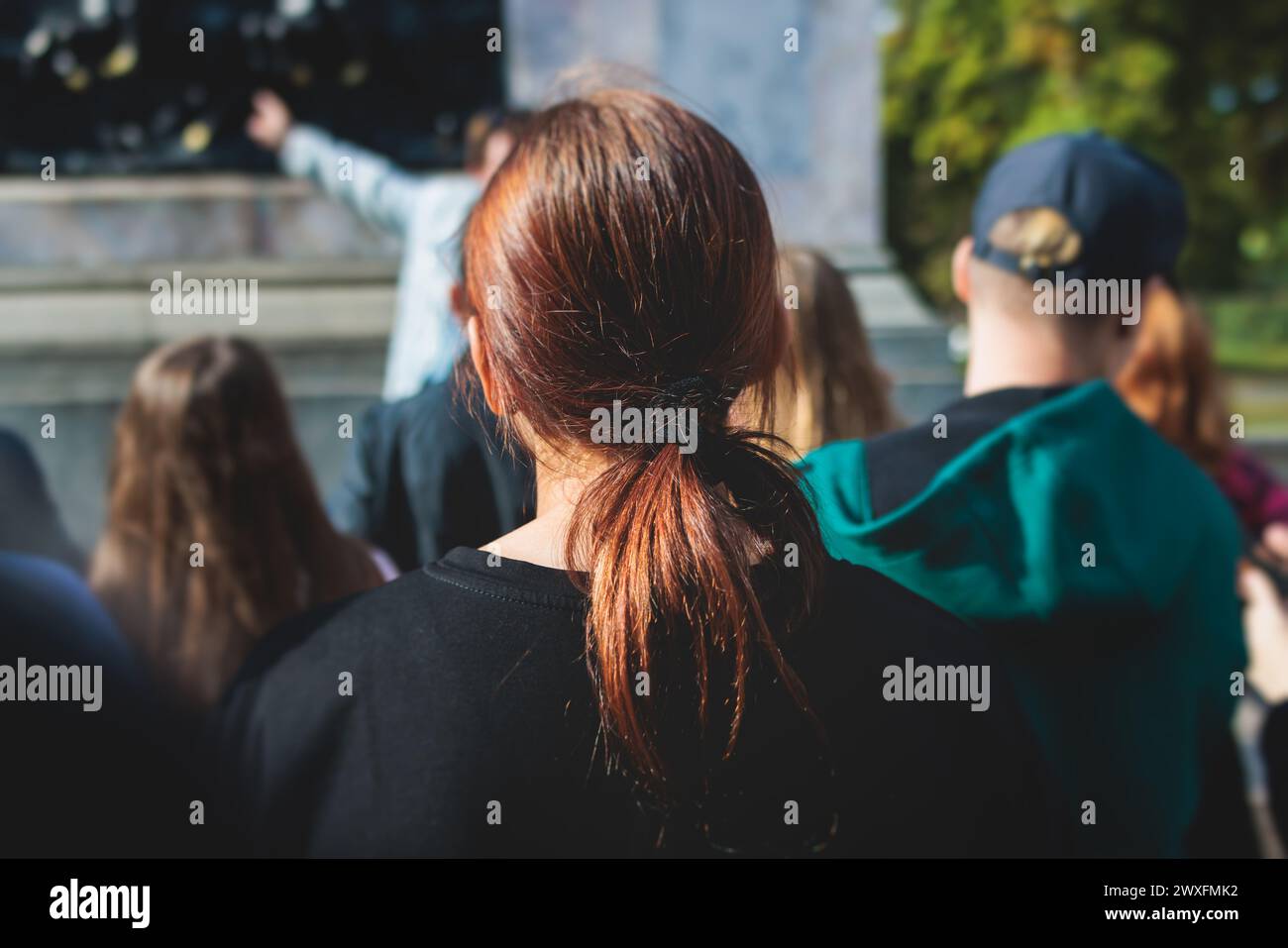 Group of students and school pupils on outdoor excursion tour in the ...