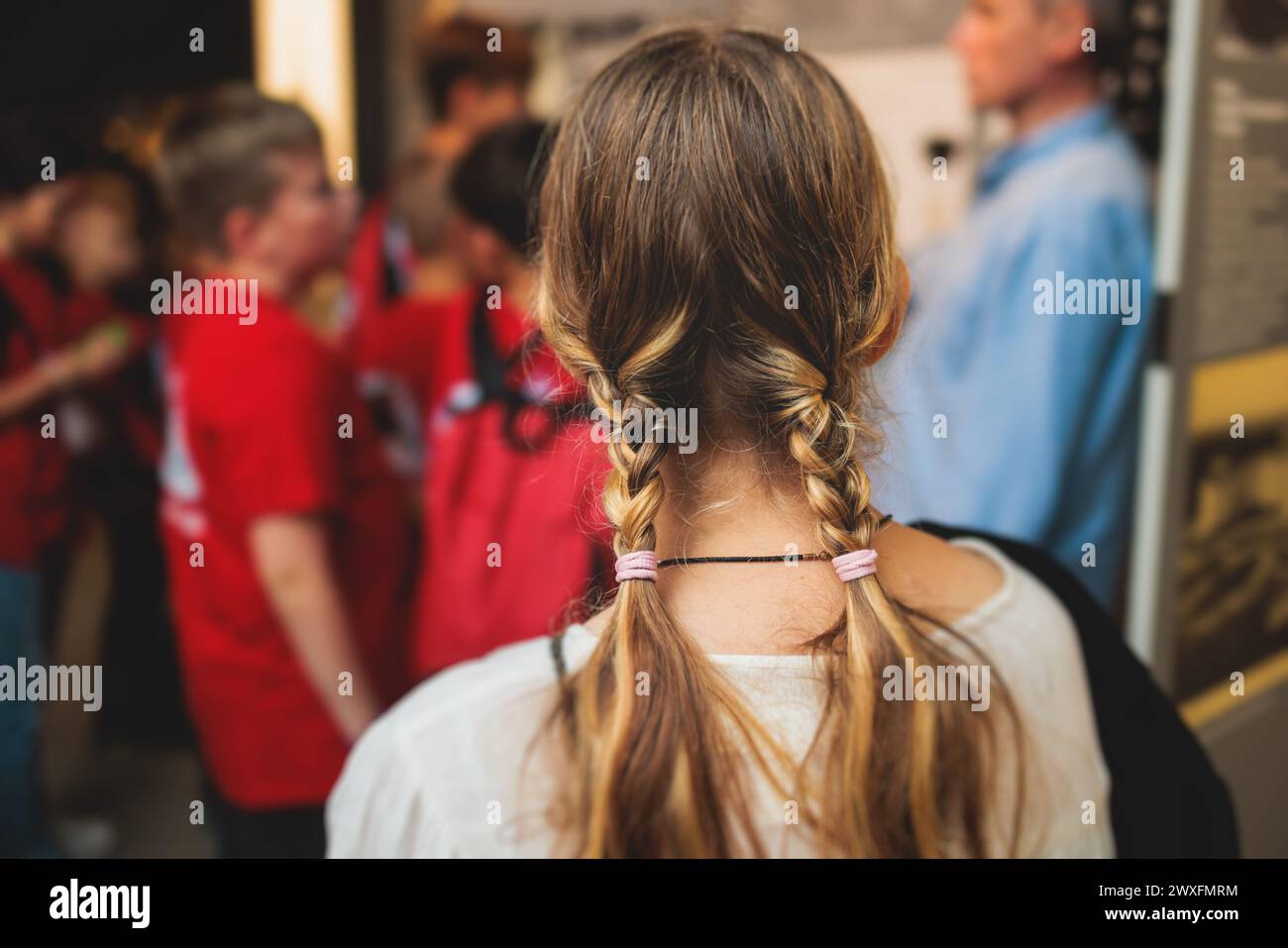 Group of students and school pupils in a science museum exhibition ...