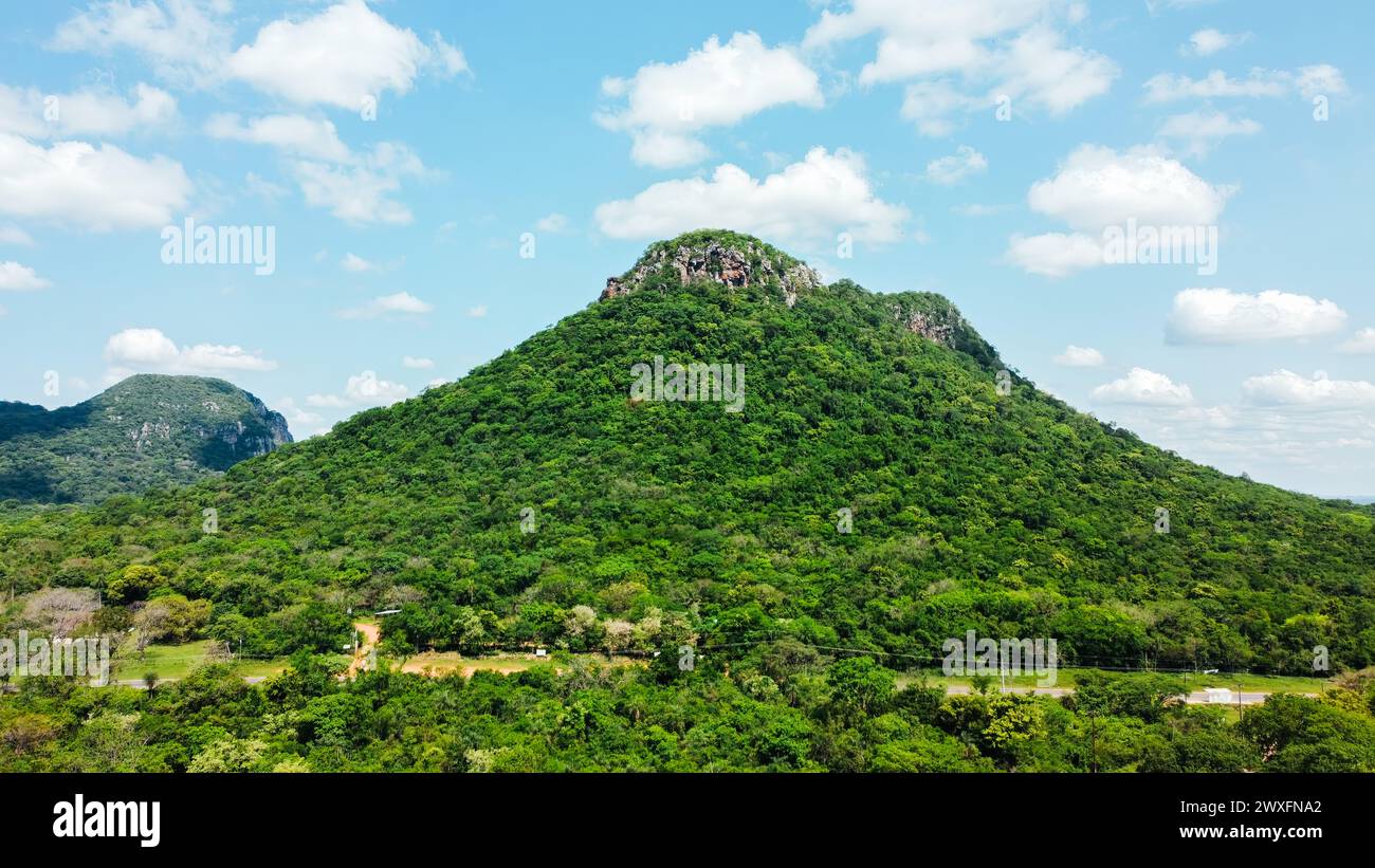 A stunning mountain overflowing with greenery offers a mesmerizing and ...