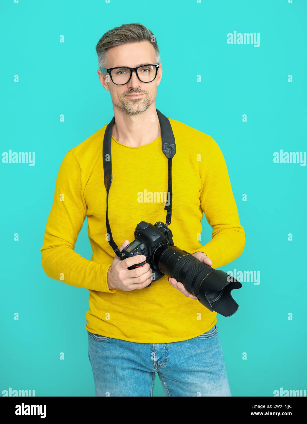 Photographer hold photo camera. Professional photography. Shooting ...